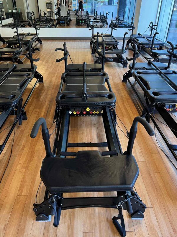 What Are the Different Types of Pilates Reformers? - PE Pilates